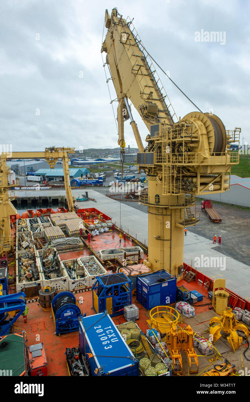 Normand Clipper berthing and putting ashore decommissioned oil rig ...