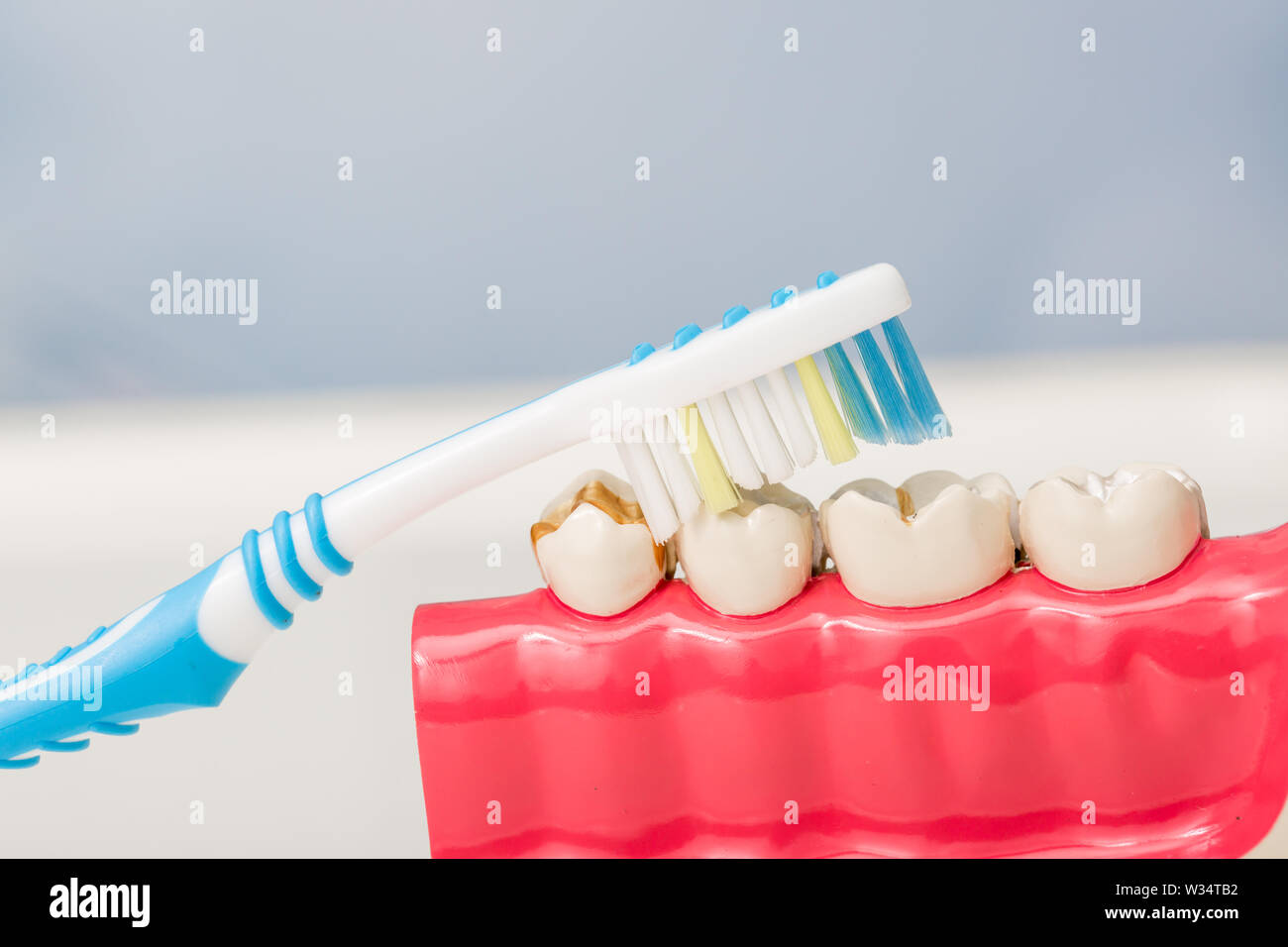 White teeth and dental instruments Stock Photo - Alamy