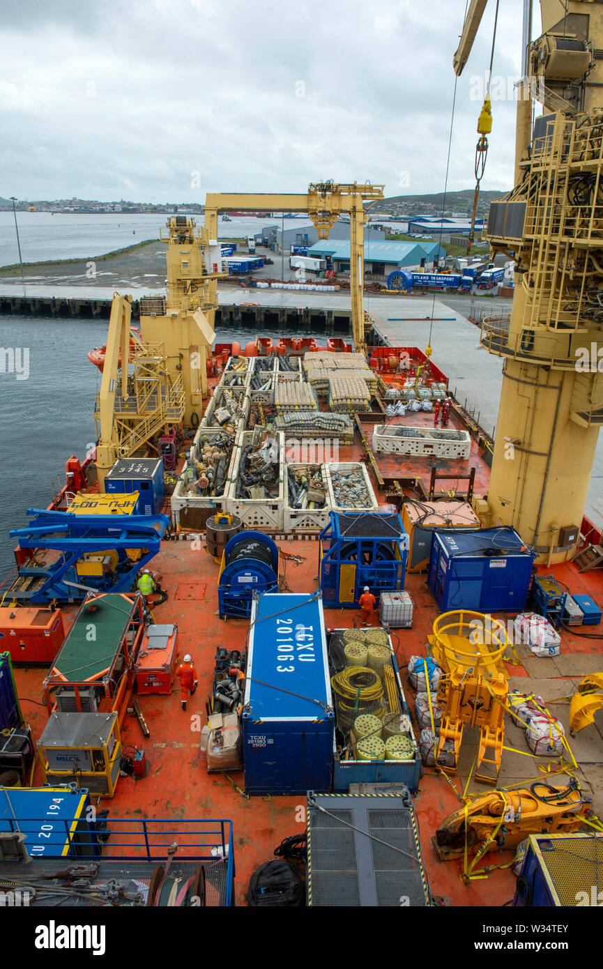 Normand Clipper berthing and putting ashore decommissioned oil rig ...
