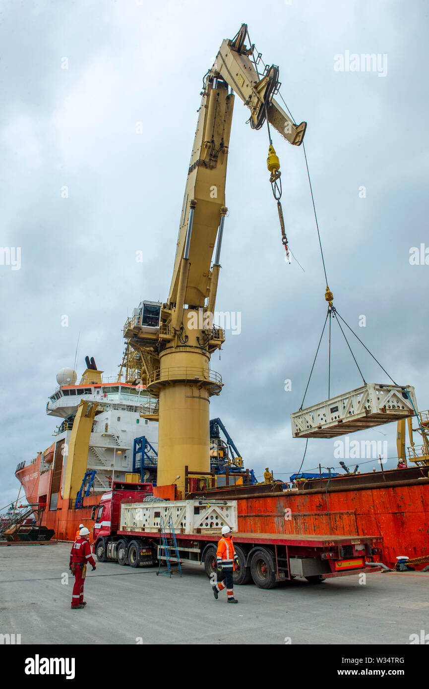 Normand Clipper berthing and putting ashore decommissioned oil rig ...