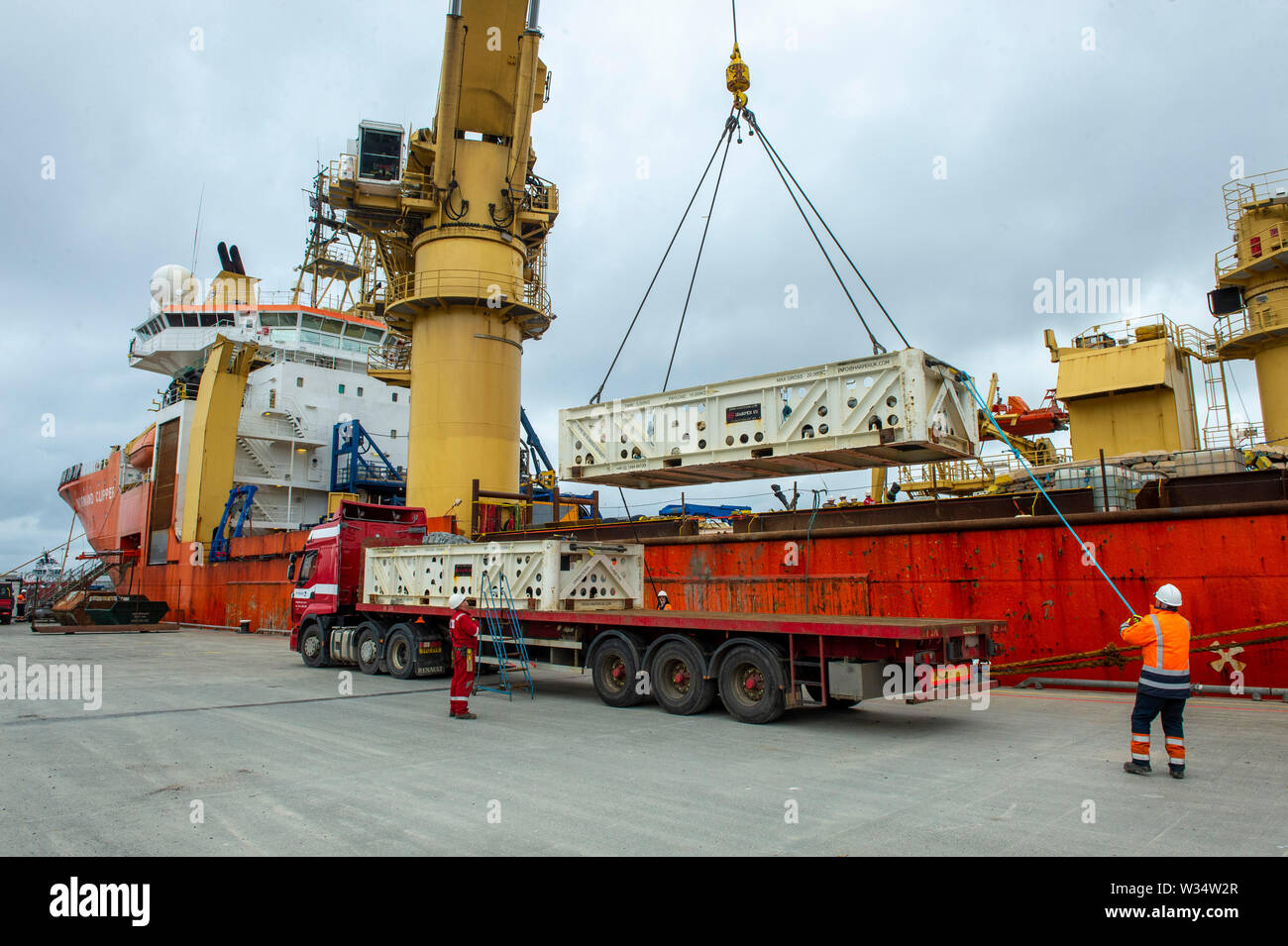 Normand Clipper berthing and putting ashore decommissioned oil rig ...