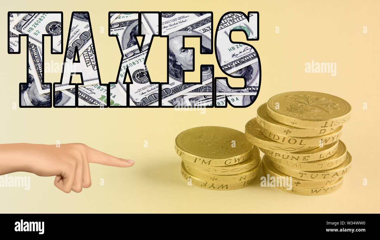 "TAXES" word with notes inscribed and coin stack in front. Pile of ...