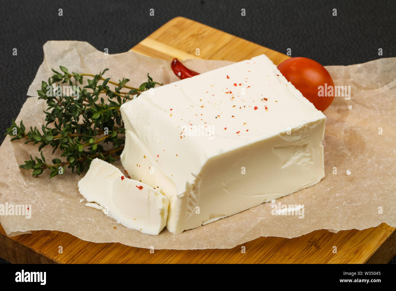Traditional Feta Cheese served thyme Stock Photo - Alamy