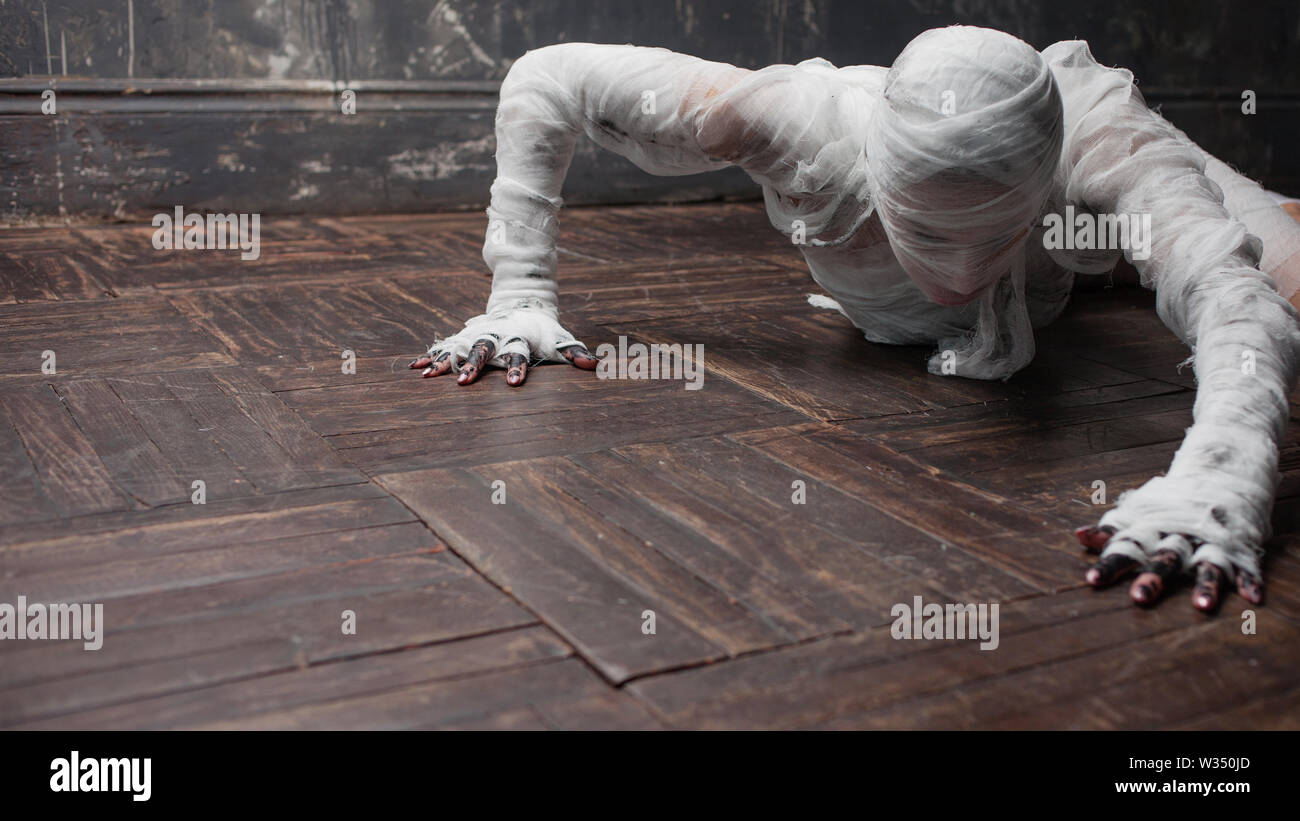 Scary mummy creeps on you. The girl with the bandage Crawling on the ...