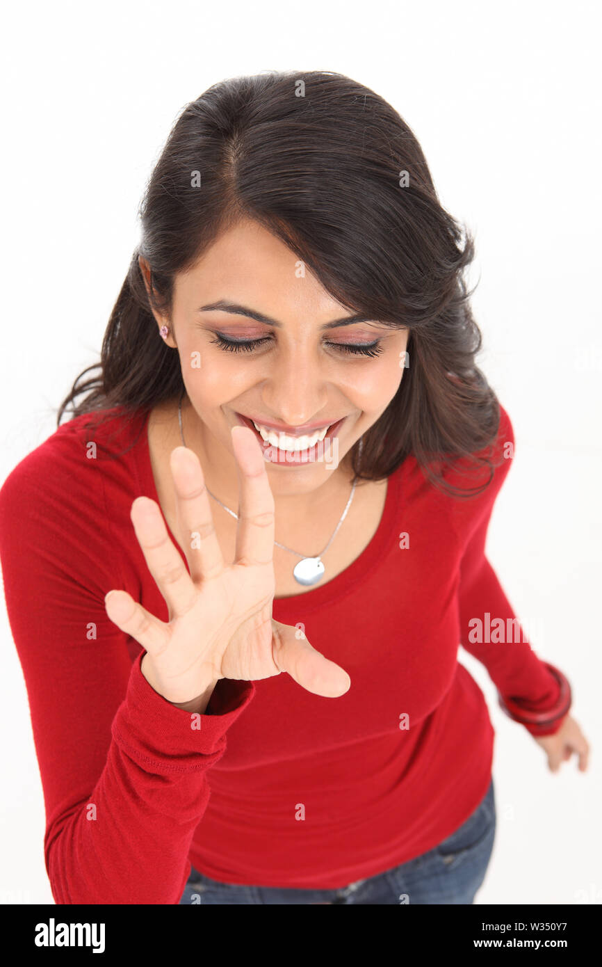 Woman smiling with her eyes closed Stock Photo - Alamy