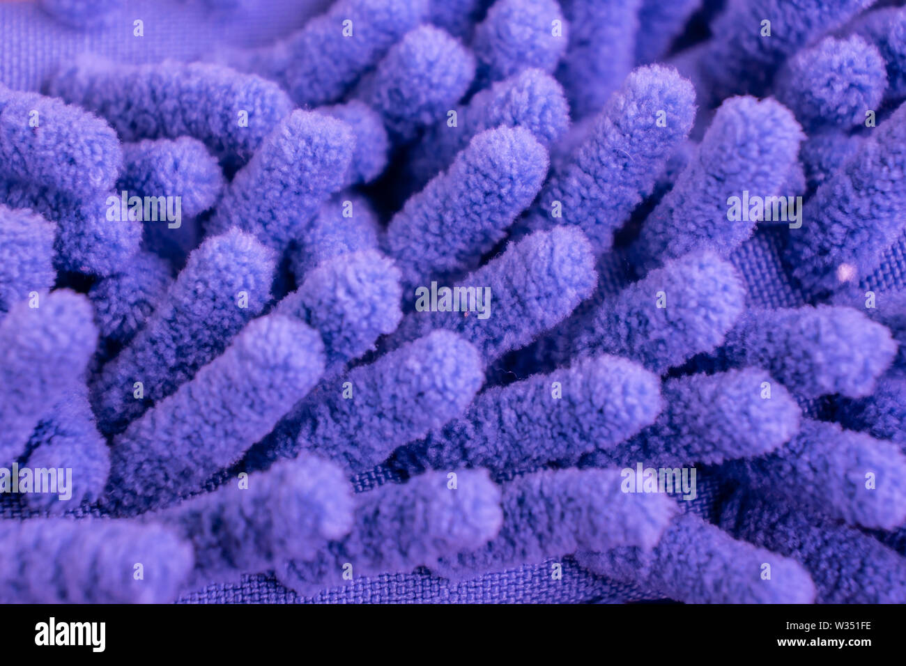 Macro close up of purple chenille microfiber texture for cleaning and ...