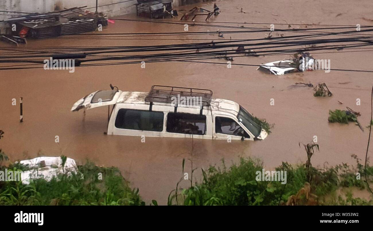 Kathmandu, Nepal. 12th July, 2019. Vehicles are submerged in Balkhu ...