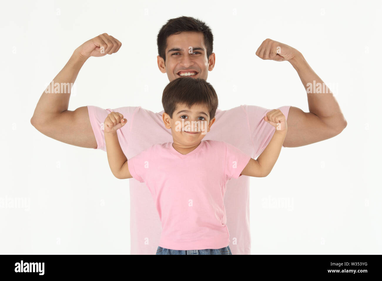 Father son flexing muscles hi-res stock photography and images - Alamy