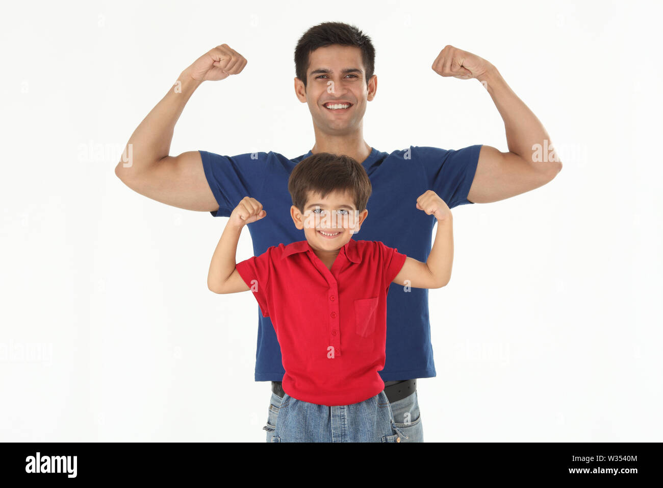 Father son flexing muscles hi-res stock photography and images - Alamy