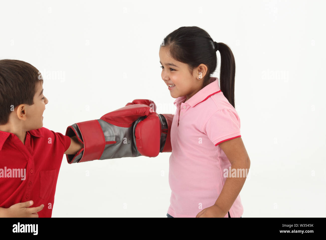 Two Indian friends practicing boxing Stock Photo - Alamy