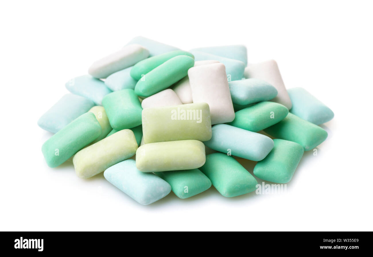 Pile of various sugar free mint chewing gum pieces isolated on white ...