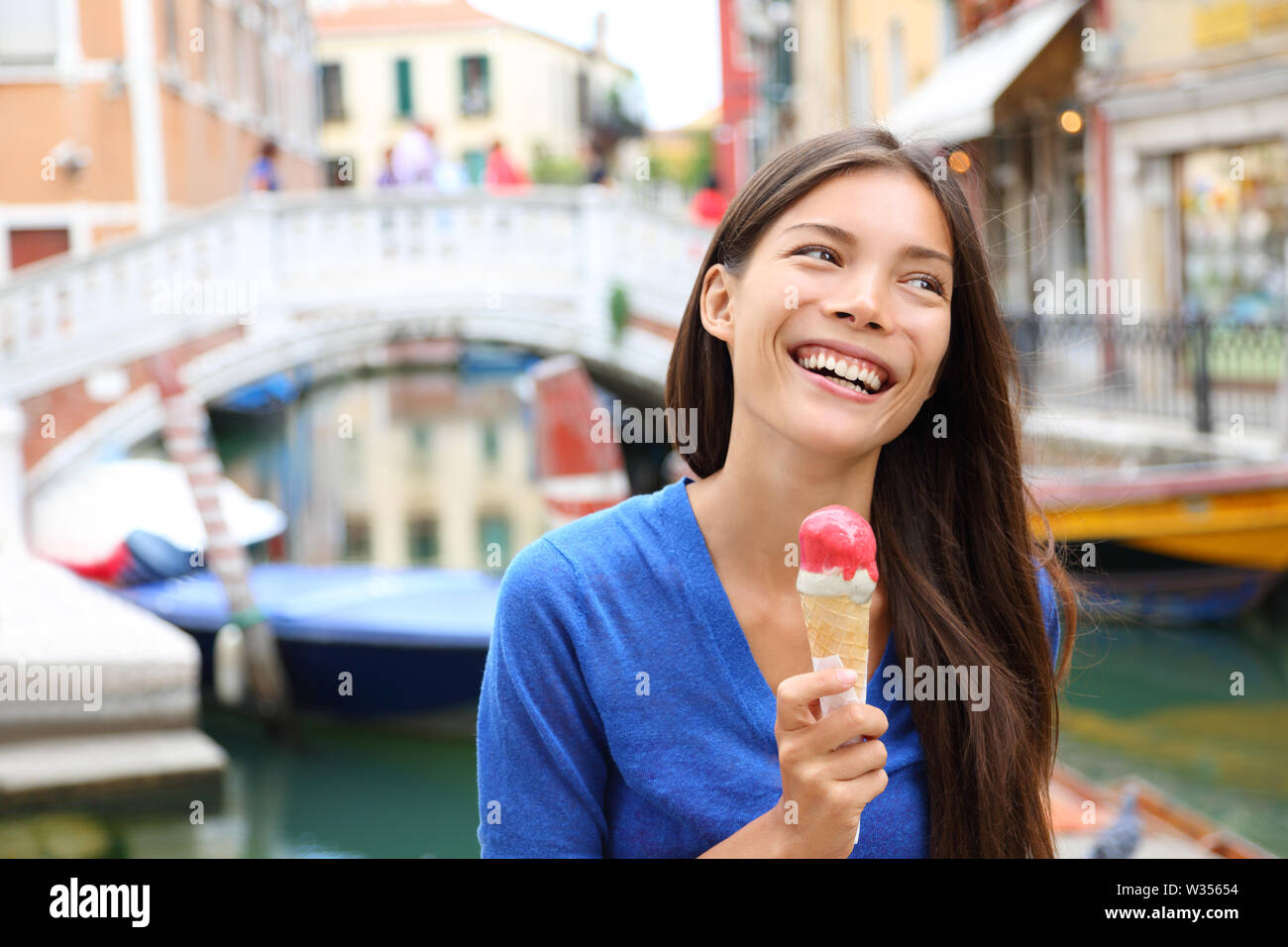 Woman In Venice Italy Eating Ice Cream On Vacation Travel Smiling