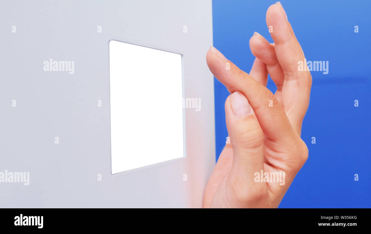 Woman hand using white empty display Stock Photo - Alamy