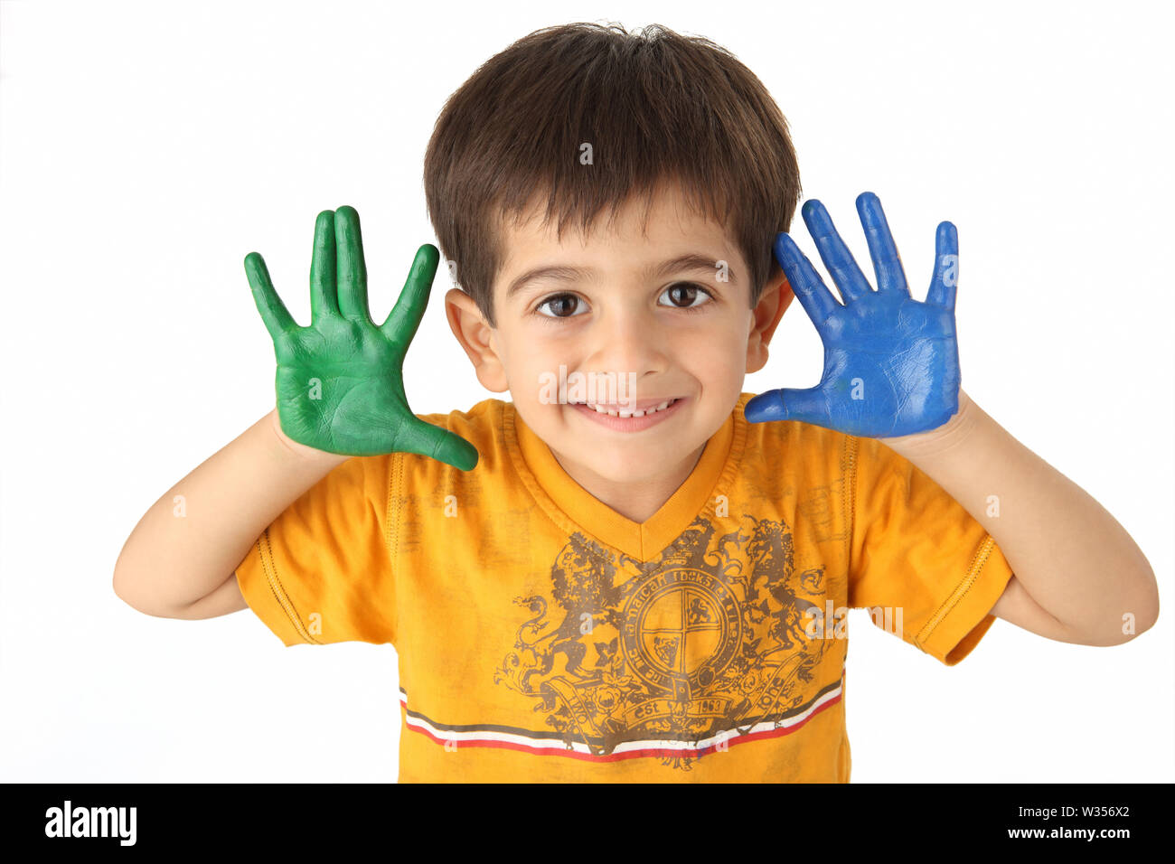 Portrait of a boy with painted hands Stock Photo - Alamy
