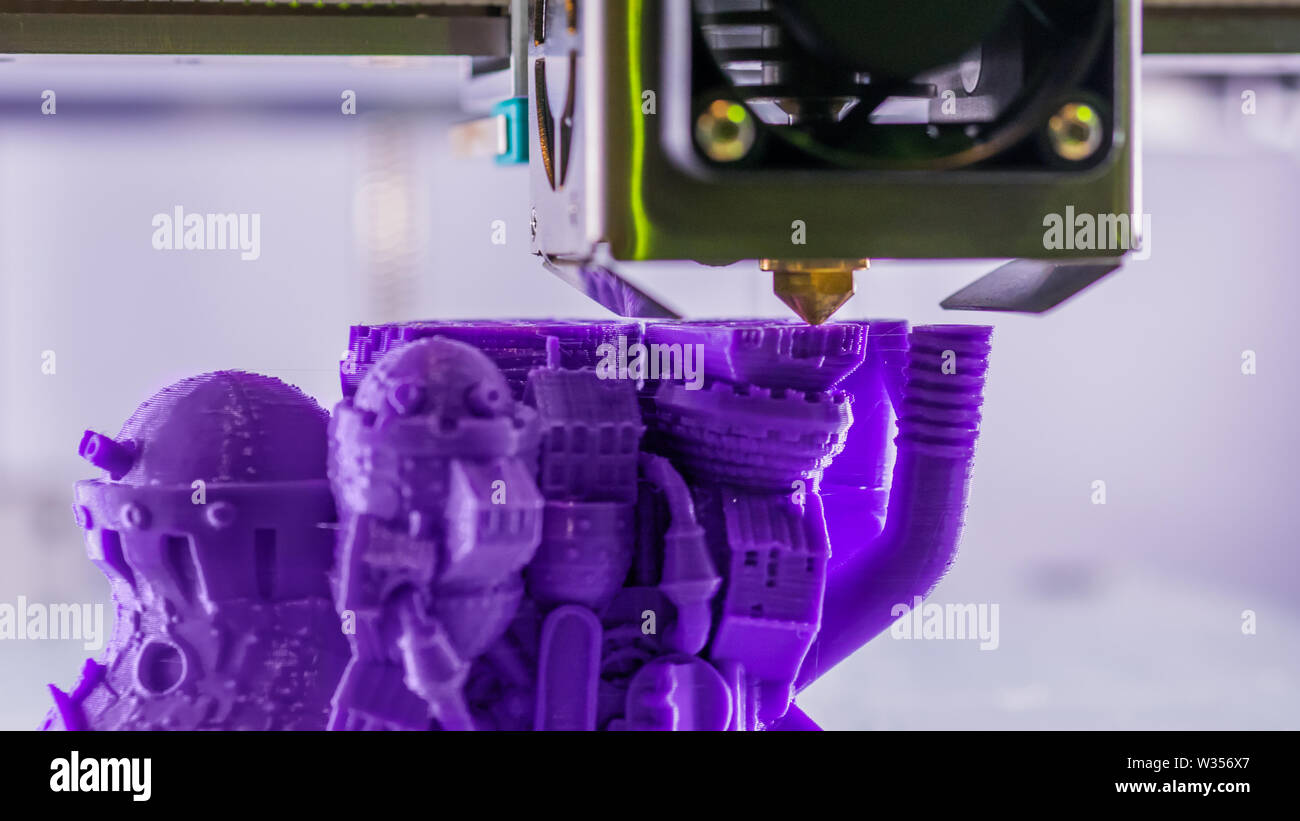 Three dimensional printing machine prints physical 3D model Stock Photo ...