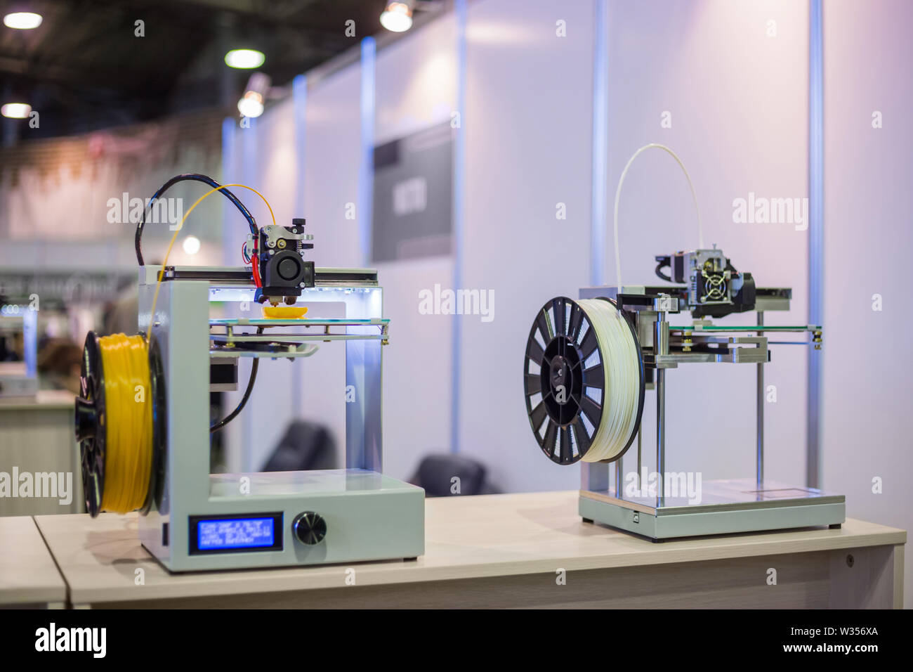 Three dimensional 3D printers during work at modern technology ...