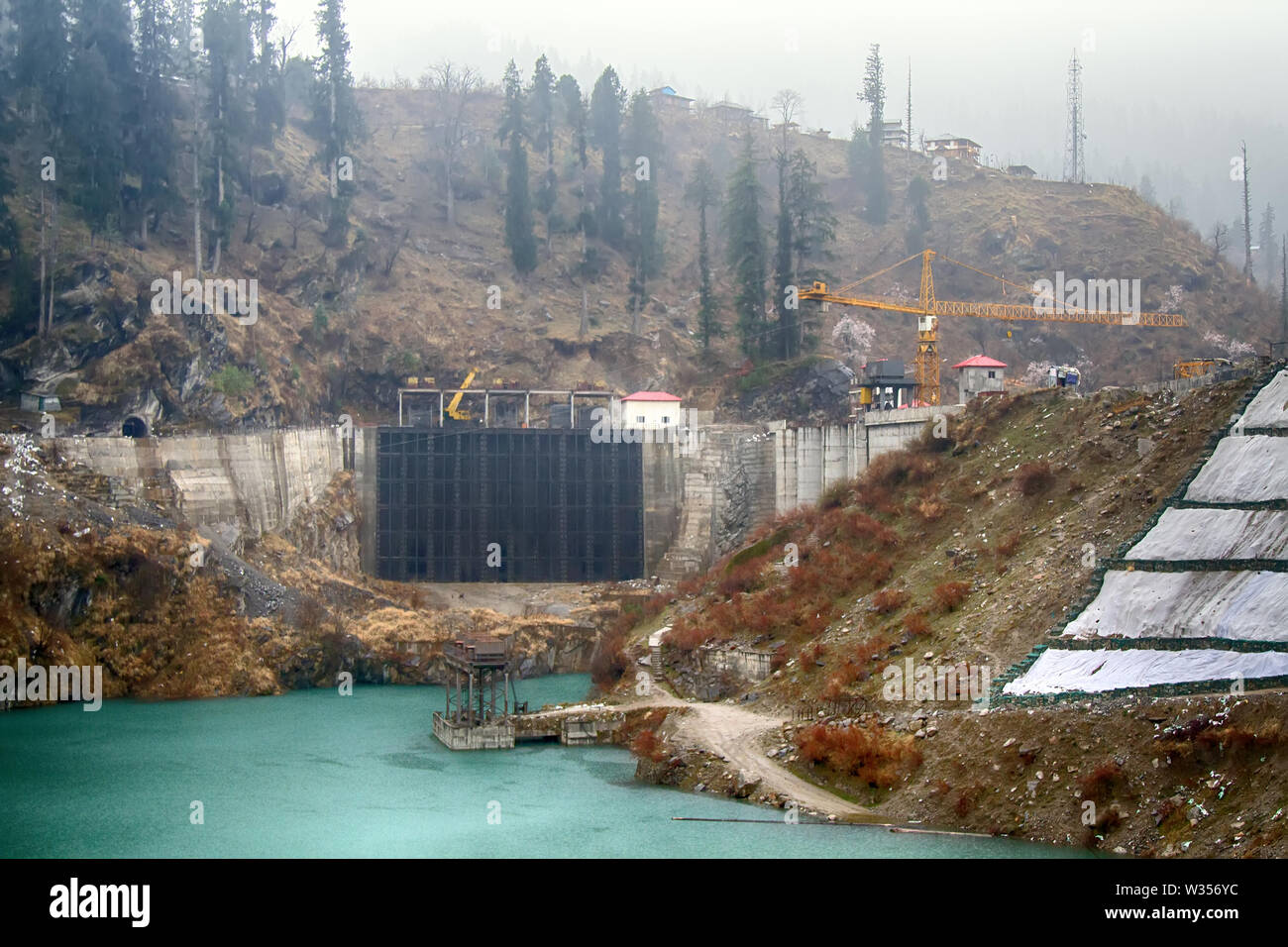 Construction of hydroelectric dam in a narrow gorge of the Sivalik ...