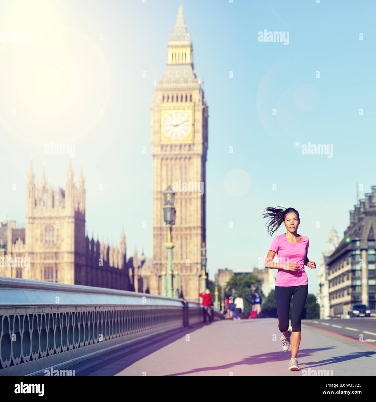 London woman running Big Ben - England lifestyle. Female runner jogging ...