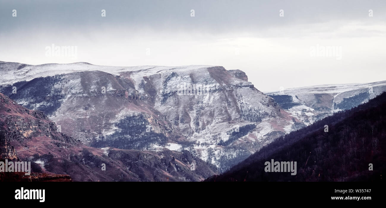 Foothills of Caucasus. Huge ravines, cliff edge with rocky walls of ...