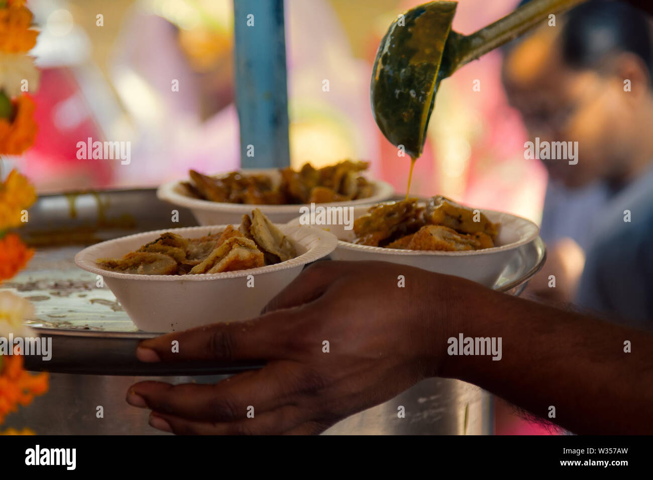Cooking and dishes from street cafes in India. Indian casual kitchen ...