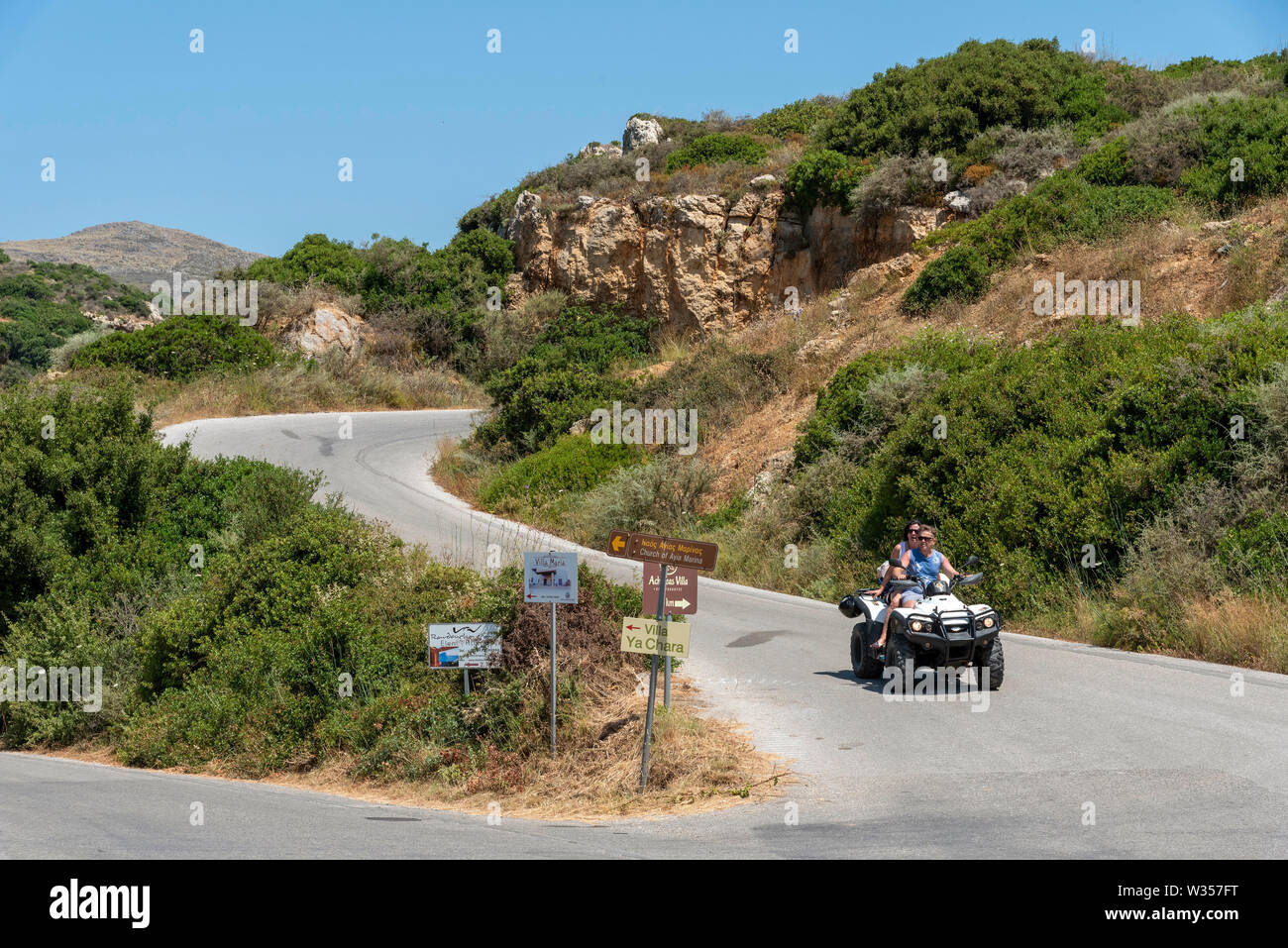 Woman on a quad bike hi-res stock photography and images - Alamy