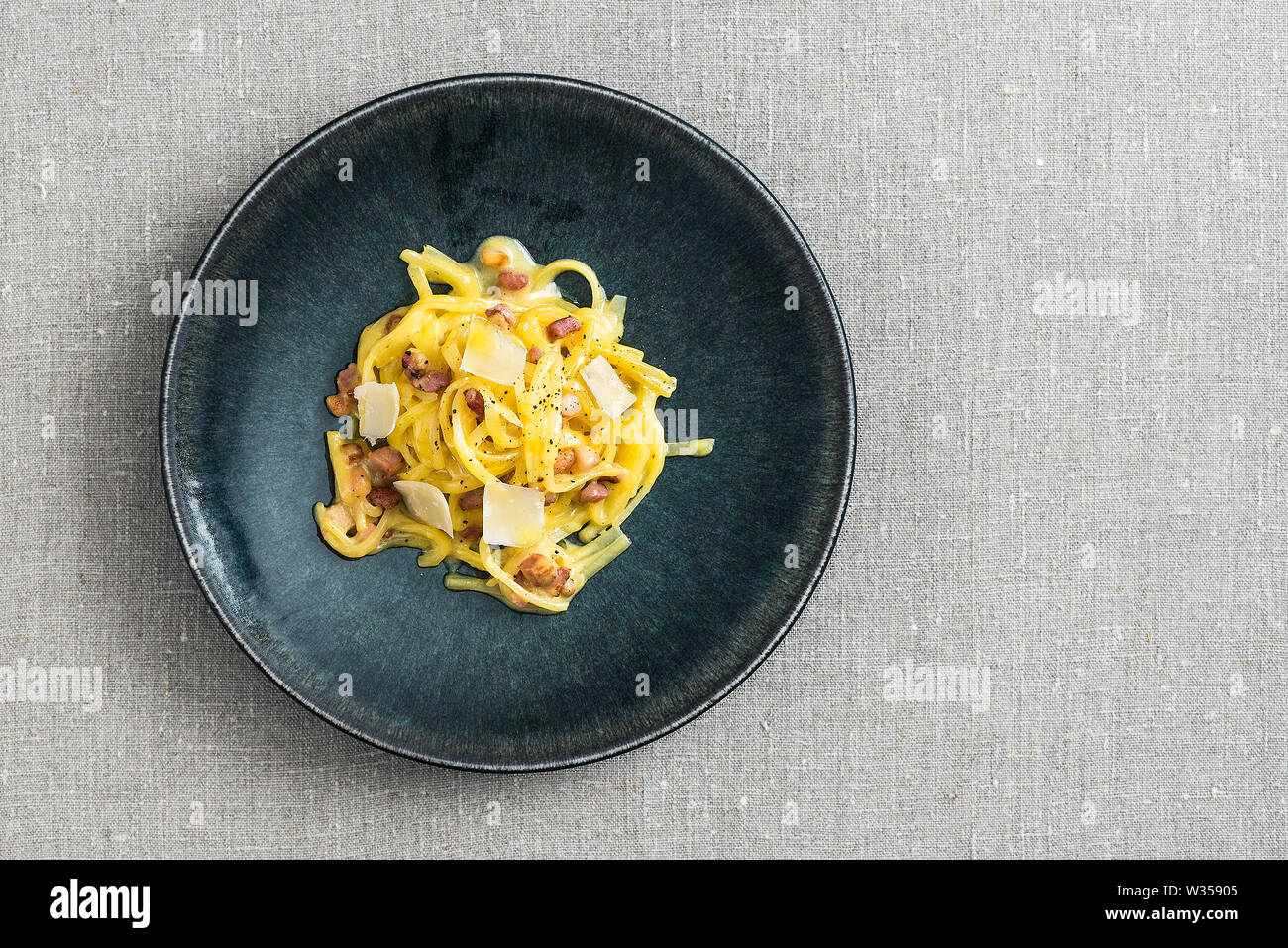 Swede carbonara, classic Italian sauce on spaghetti made from raw swede ...