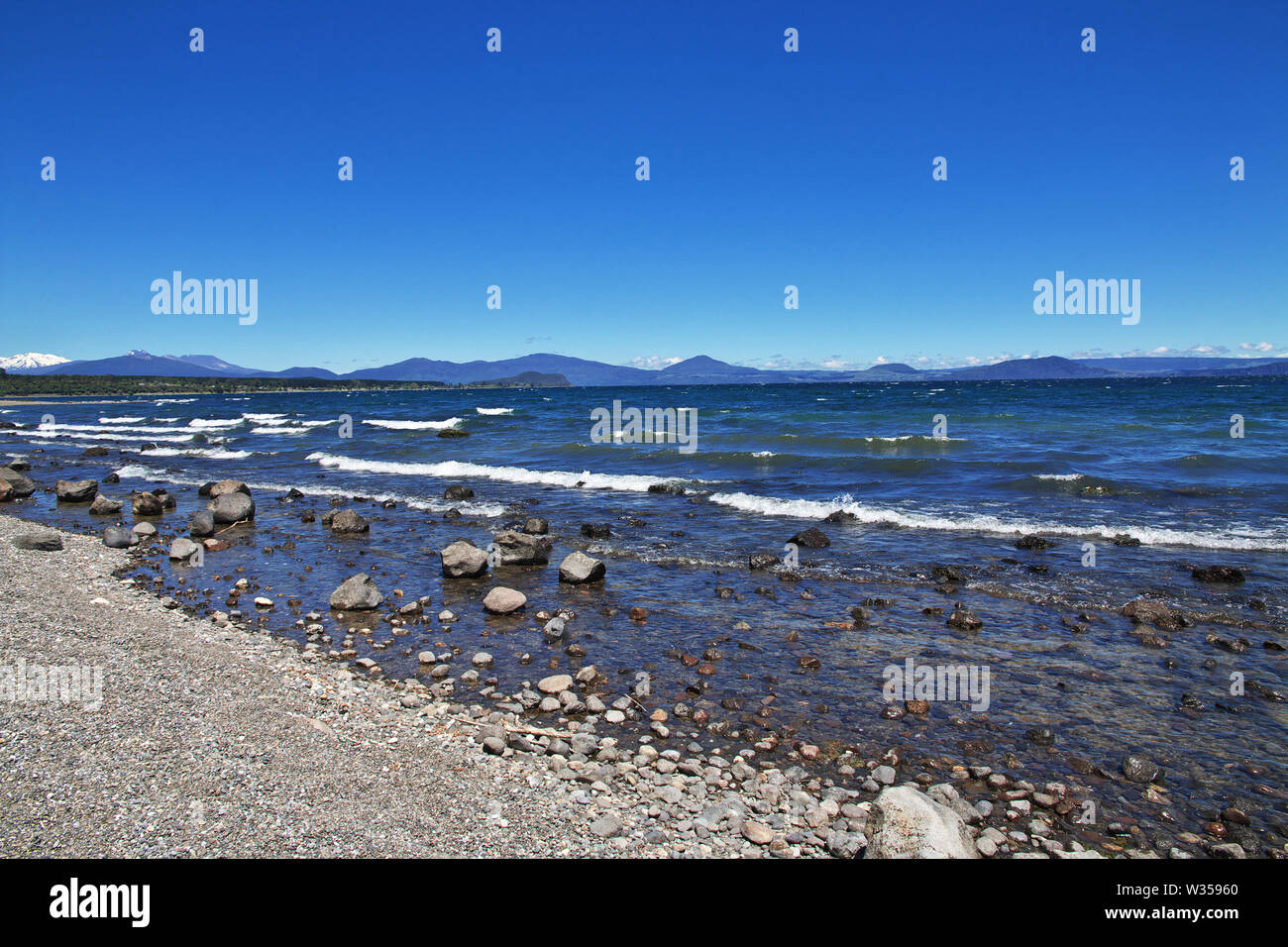 Taupo lake and tongariro volcano landscape at sunset hi-res stock ...