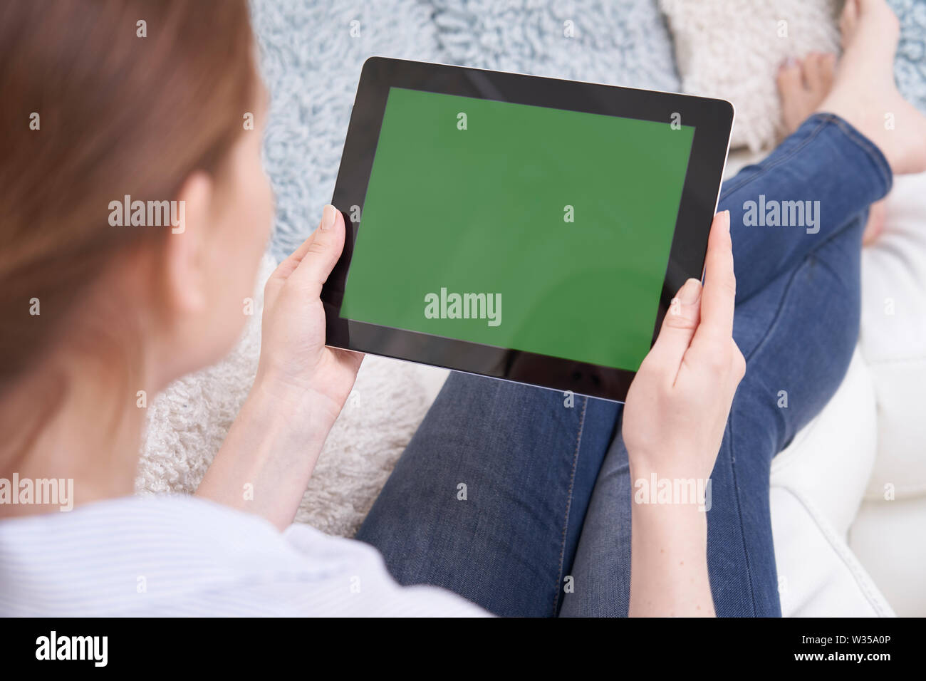 Watching tablet over the shoulder hi-res stock photography and images ...