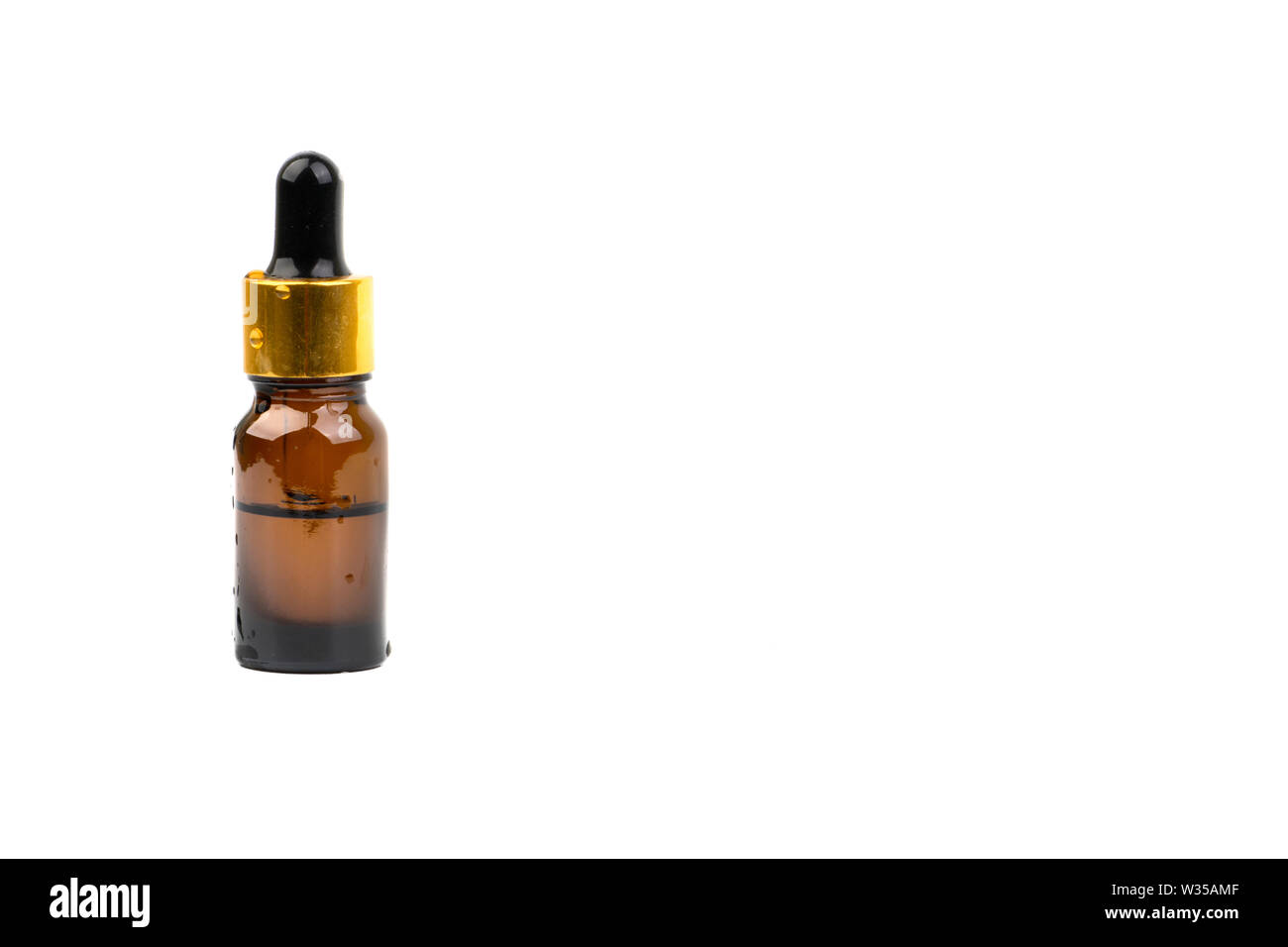 Dropper serum and brown glass bottle isolated on white background. Skin ...