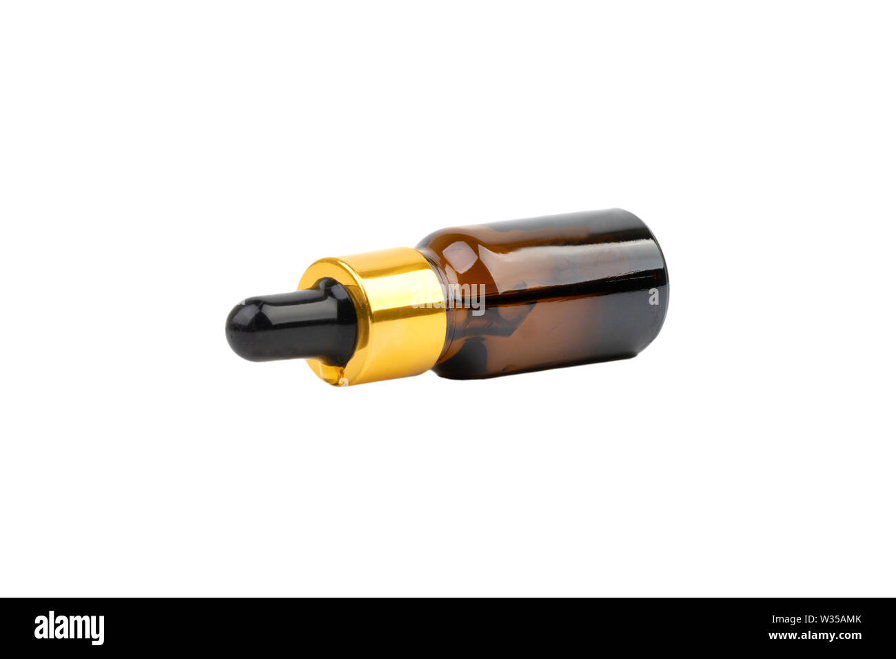 Dropper serum and brown glass bottle isolated on white background. Skin ...