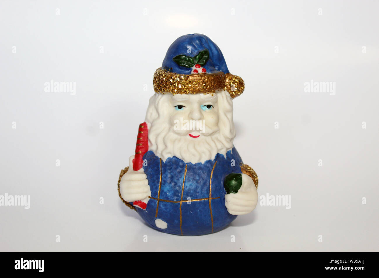 Blue Saint Nicholas ceramic figure on light background Stock Photo - Alamy