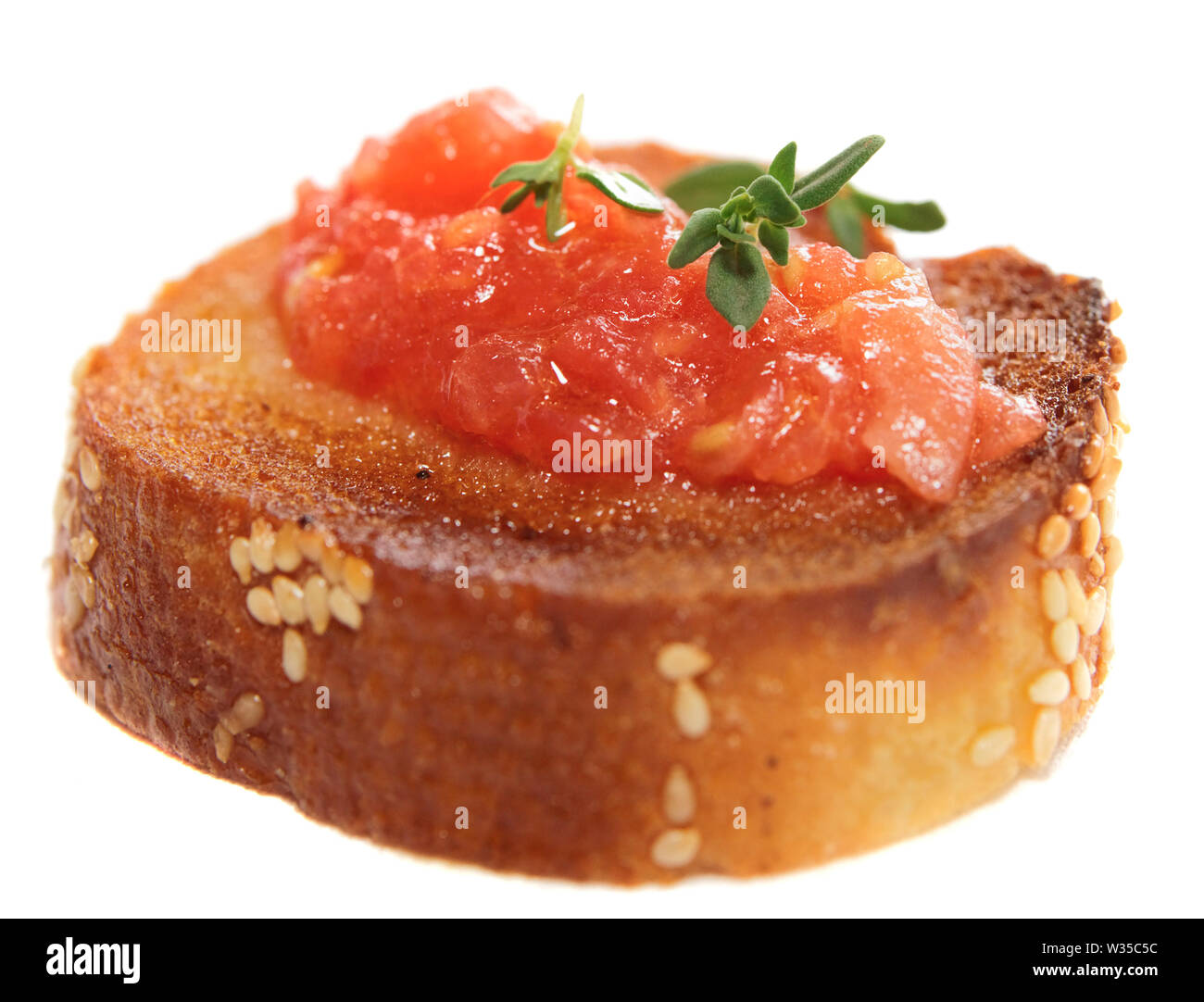 Spanish tapas (snack) with spicy tomato mix on toast, isolated on white ...