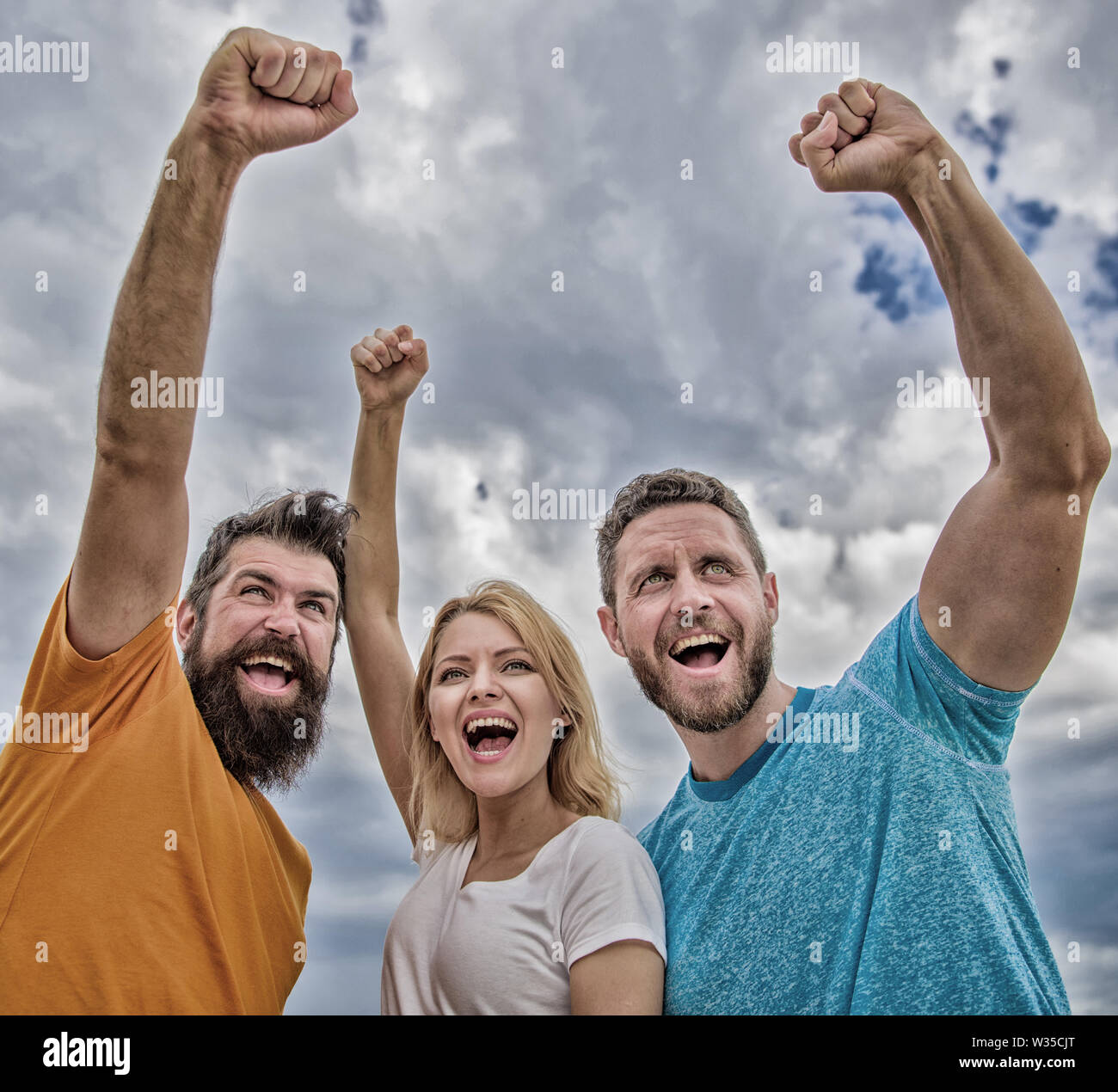 Woman and men look confident successful sky background. Behaviors of ...