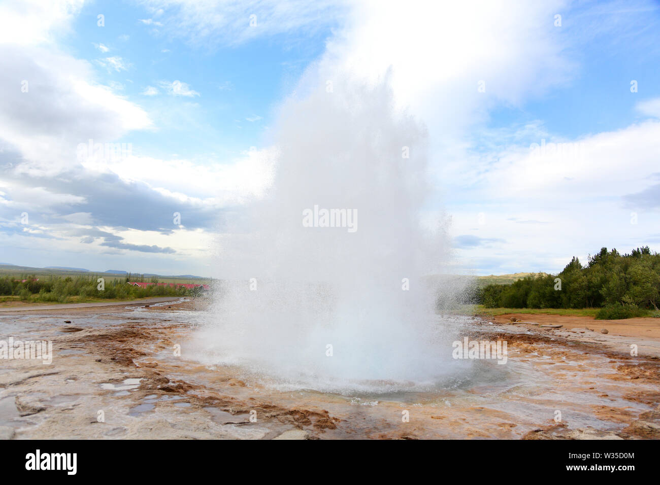 Iceland - Strokkur geyser. The famous Icelandic tourist attraction and ...