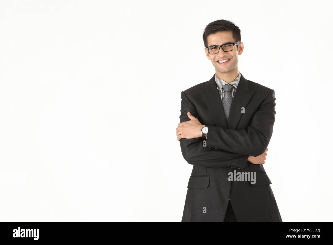 Portrait of a businessman smiling Stock Photo - Alamy