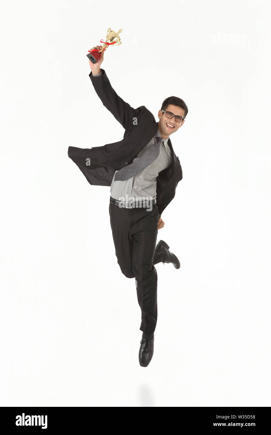 Man trophy suit Cut Out Stock Images & Pictures - Alamy