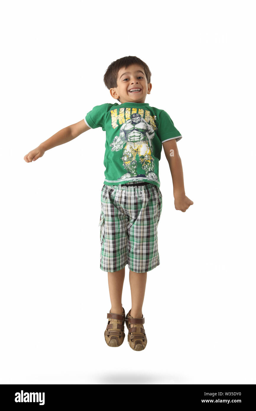 Portrait of a boy jumping Stock Photo - Alamy