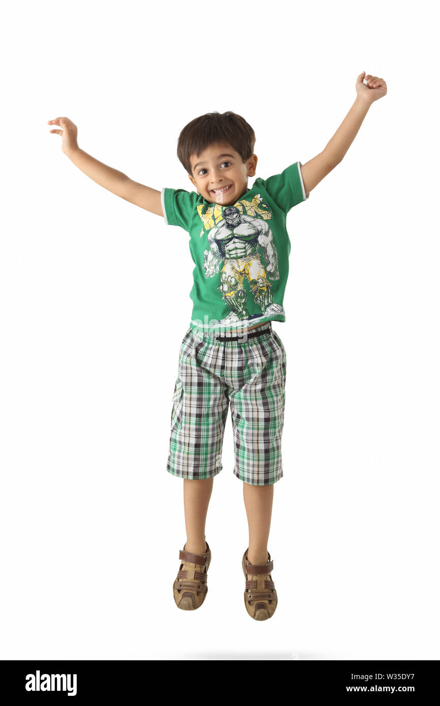 Portrait of a boy jumping Stock Photo - Alamy
