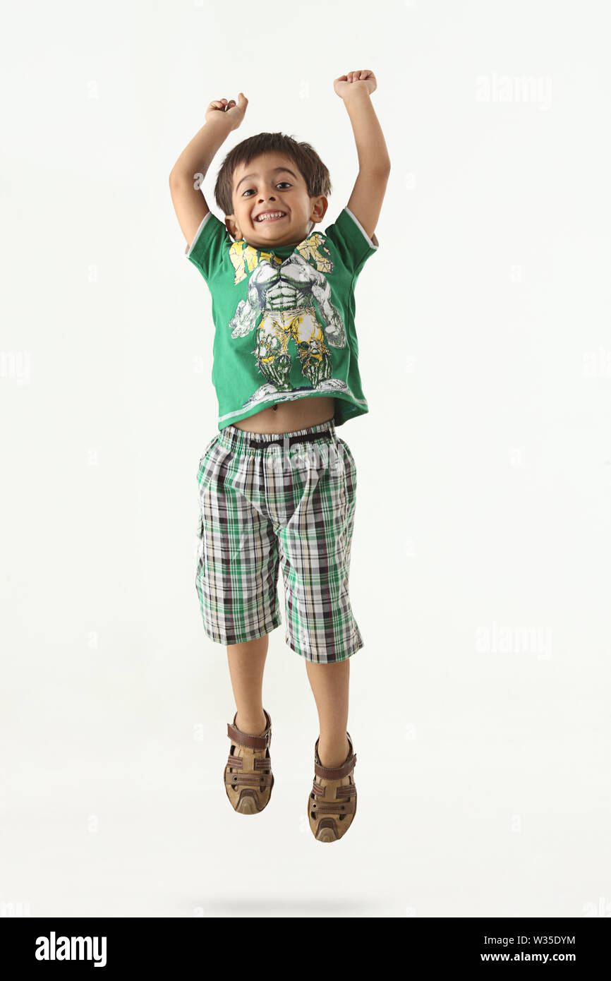 Portrait of a boy jumping Stock Photo - Alamy