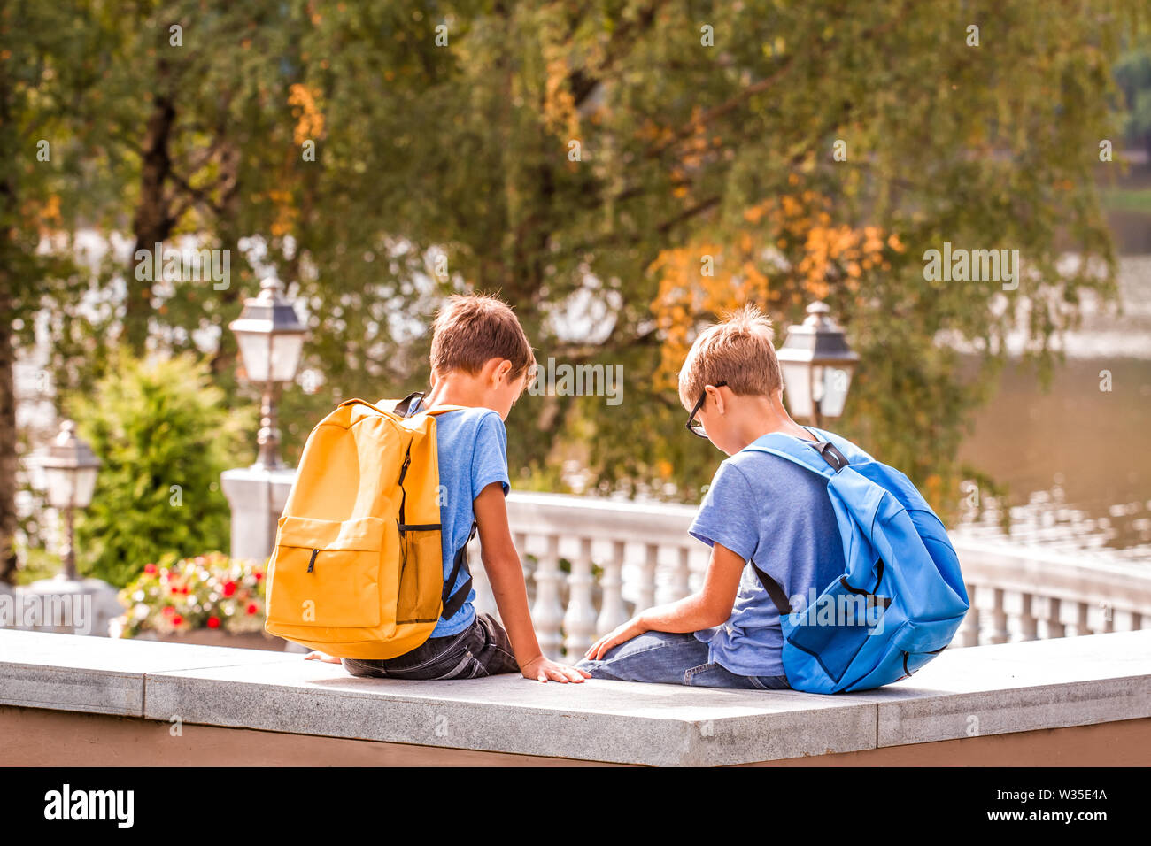 Two boys talking school hi-res stock photography and images - Alamy