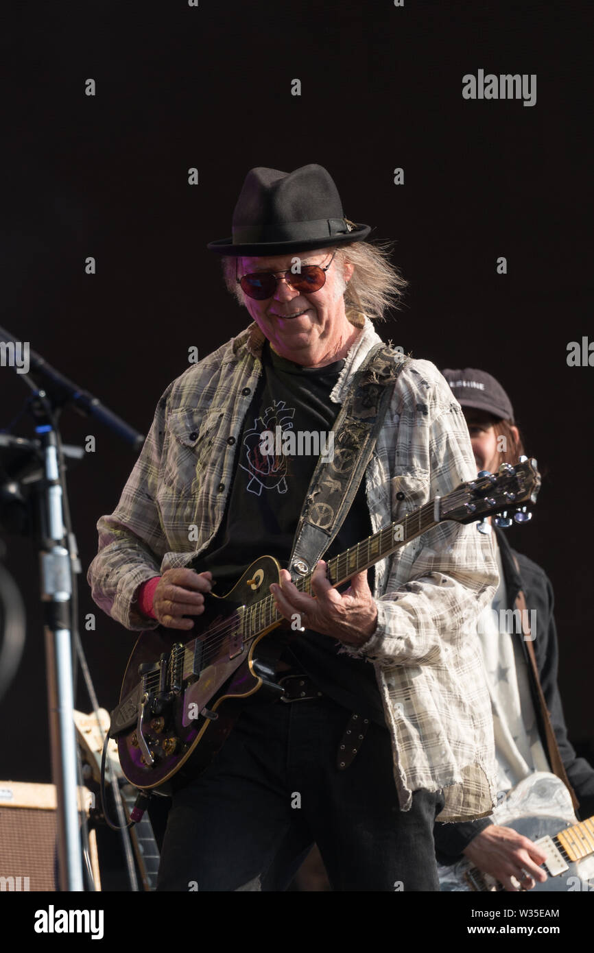 London, UK. Friday, 12 July, 2019. Neil Young performing on stage in ...