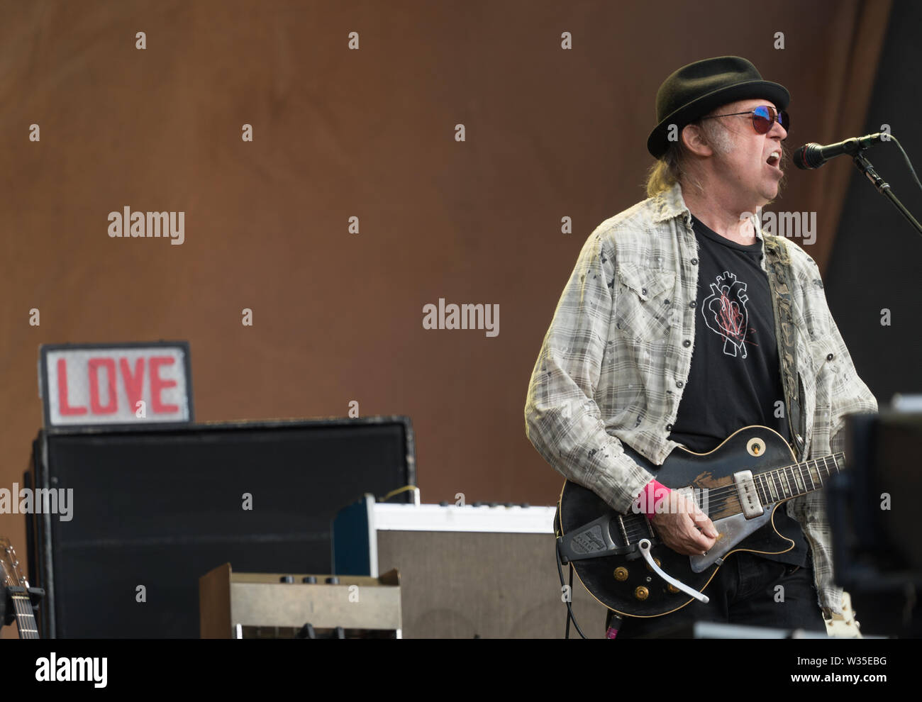 London, UK. Friday, 12 July, 2019. Neil Young performing on stage in ...