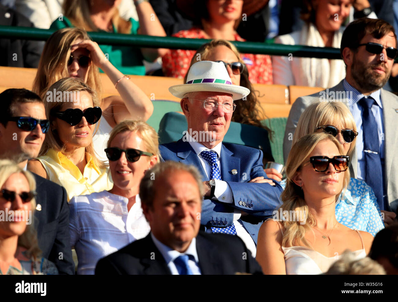 Sir Alex Ferguson sports a Wimbledon sun hat on day eleven of the ...