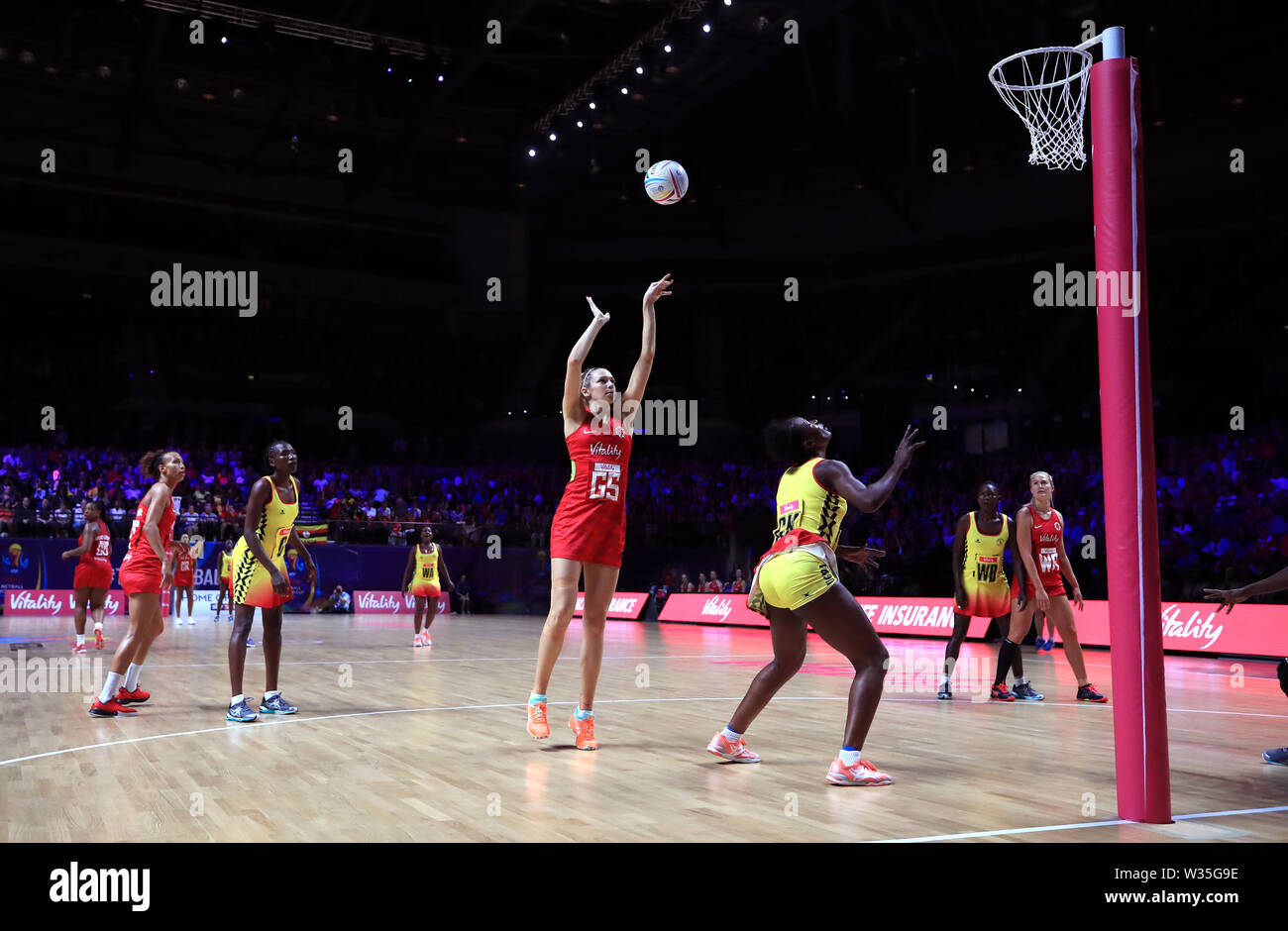 England's Joanne Harten shoots during the Netball World Cup match at ...