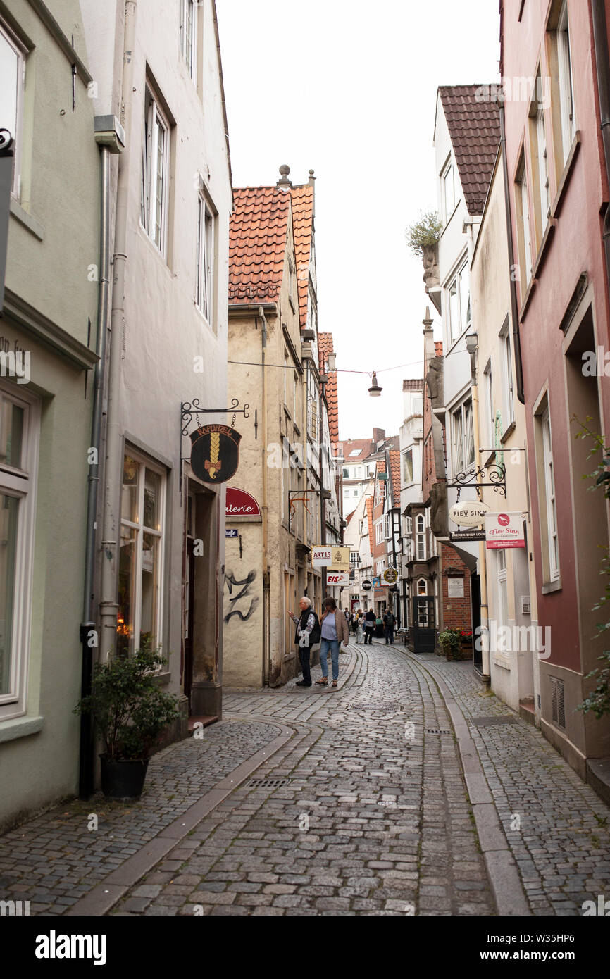 Shops, galleries, and cafes line the narrow streets of the Schnoor ...