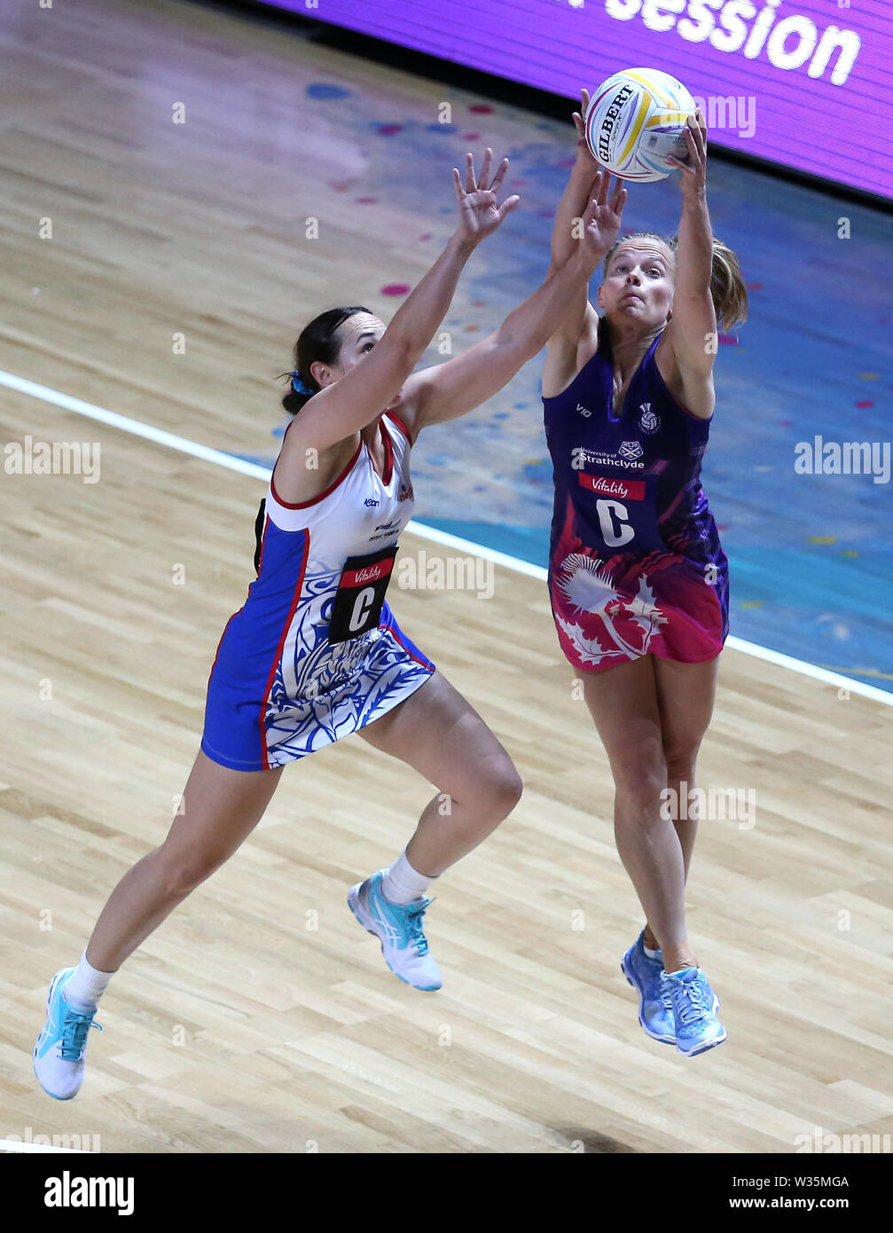 Scotland's Claire Maxwell (right) and Samoa's Brooke Amber Williams ...