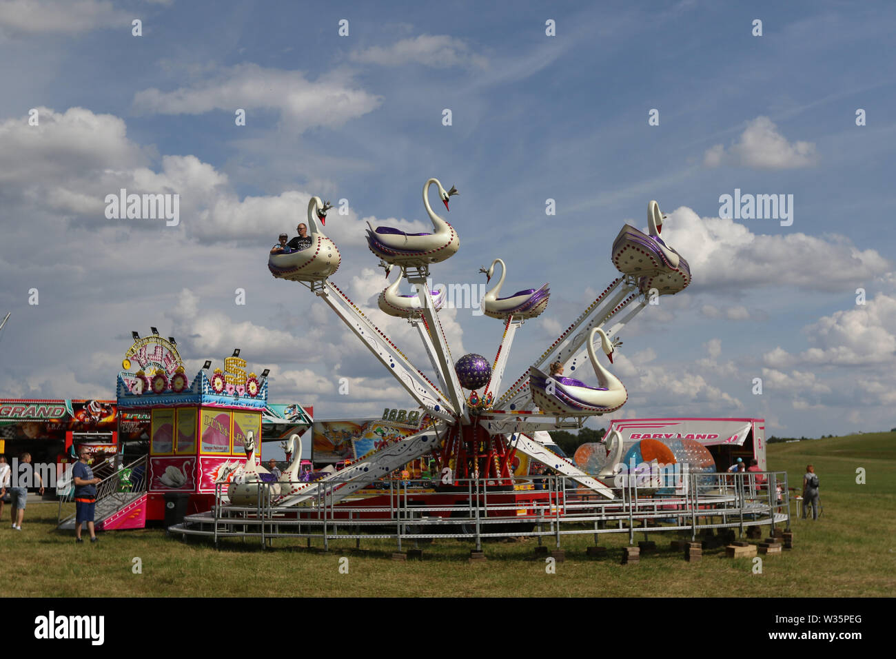 Grunwald, Poland. 12th, July 2019 Carousel in an amusement park is seen ...