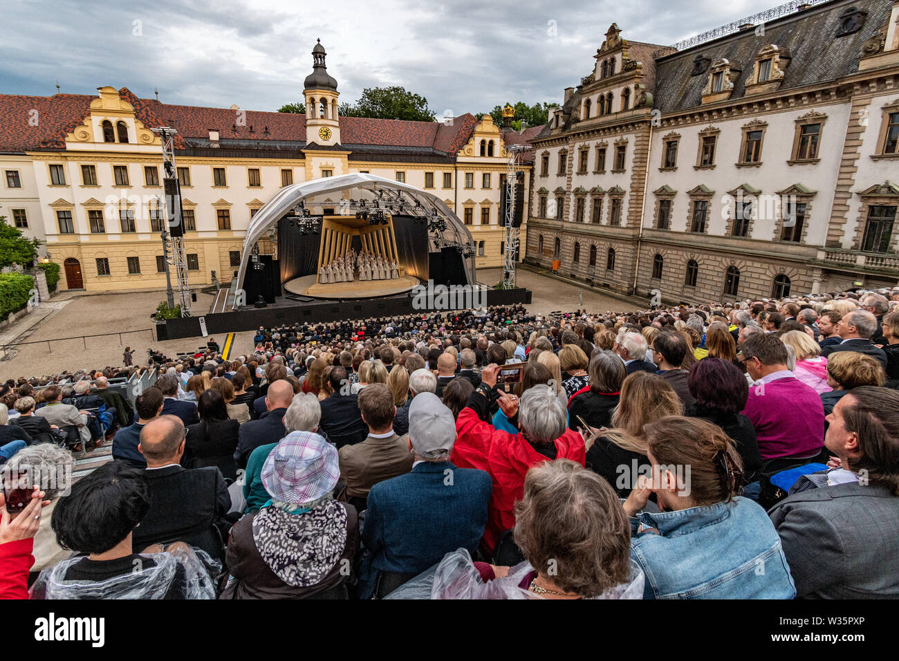 Regensburg, Germany. 12th July, 2019. Spectators sit during the Thurn ...