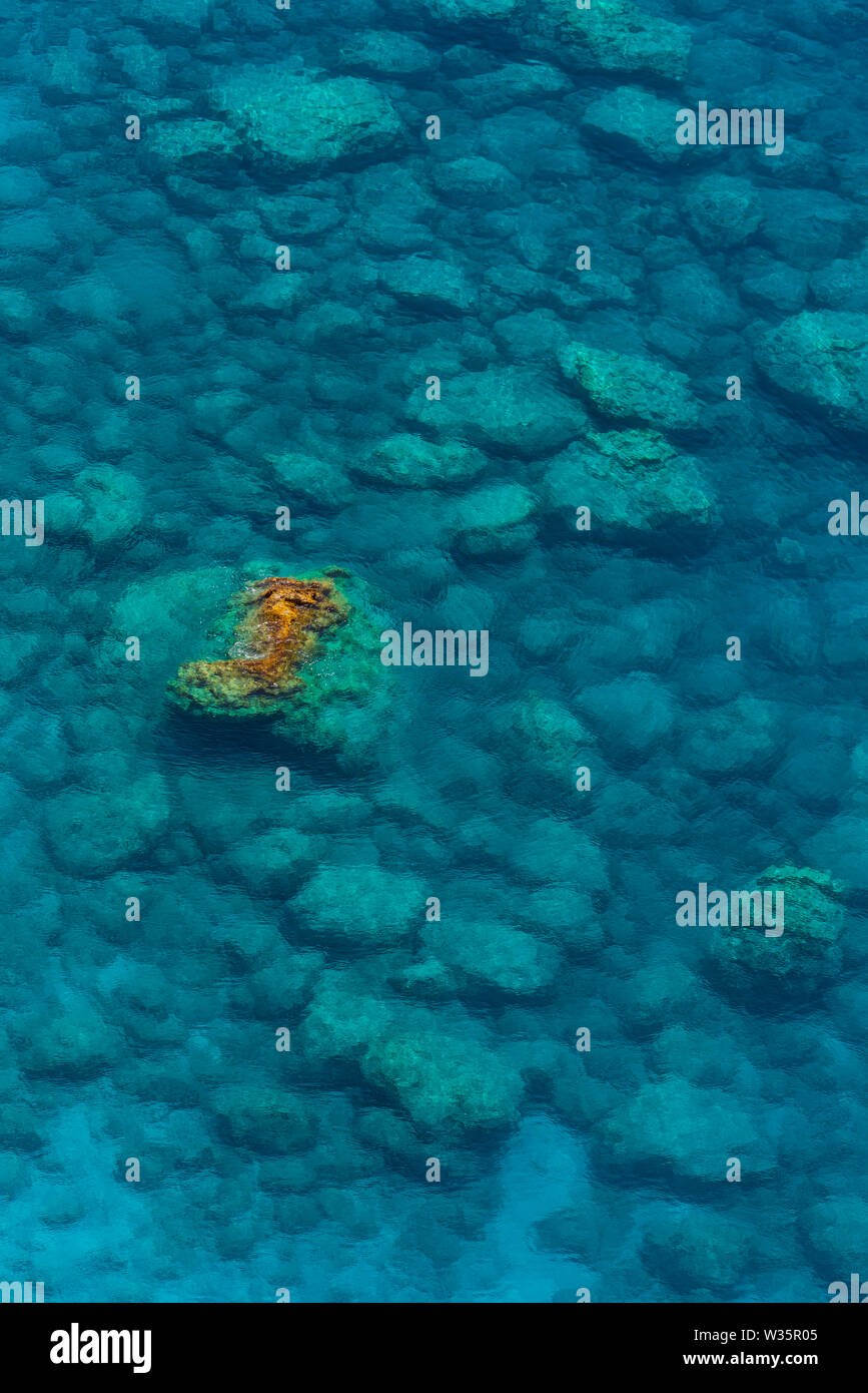 Stone jutting out of the water hi-res stock photography and images - Alamy