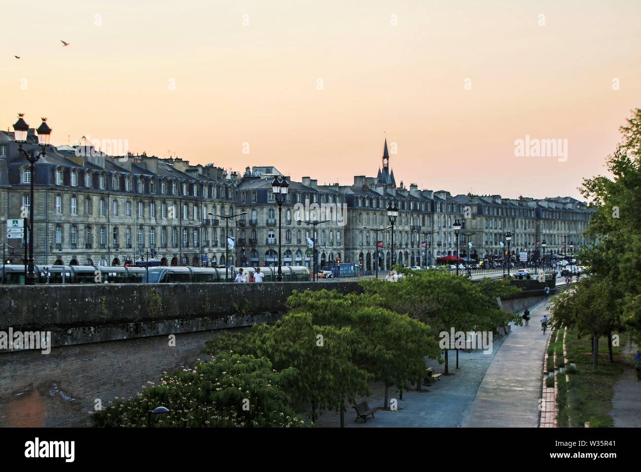 The skyline of Bordeaux at sunset Stock Photo - Alamy